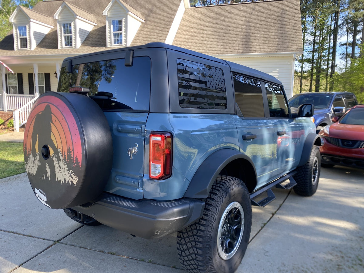 Unleashing the Wild Side: Ford Broncos and Sasquatch Spare Tire Cover